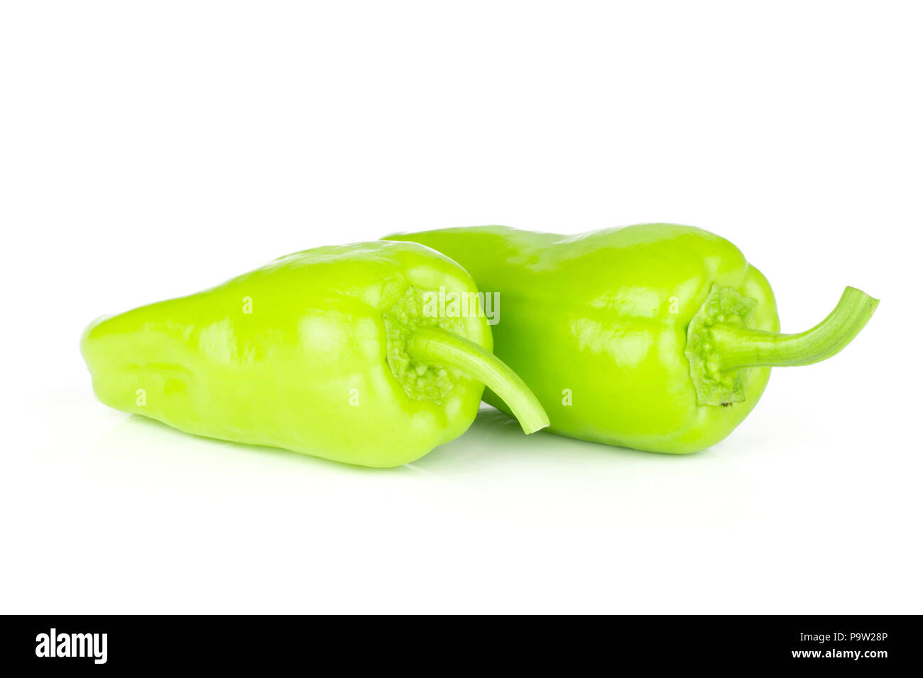 Group of two whole light green bell pepper isolated on white Stock ...