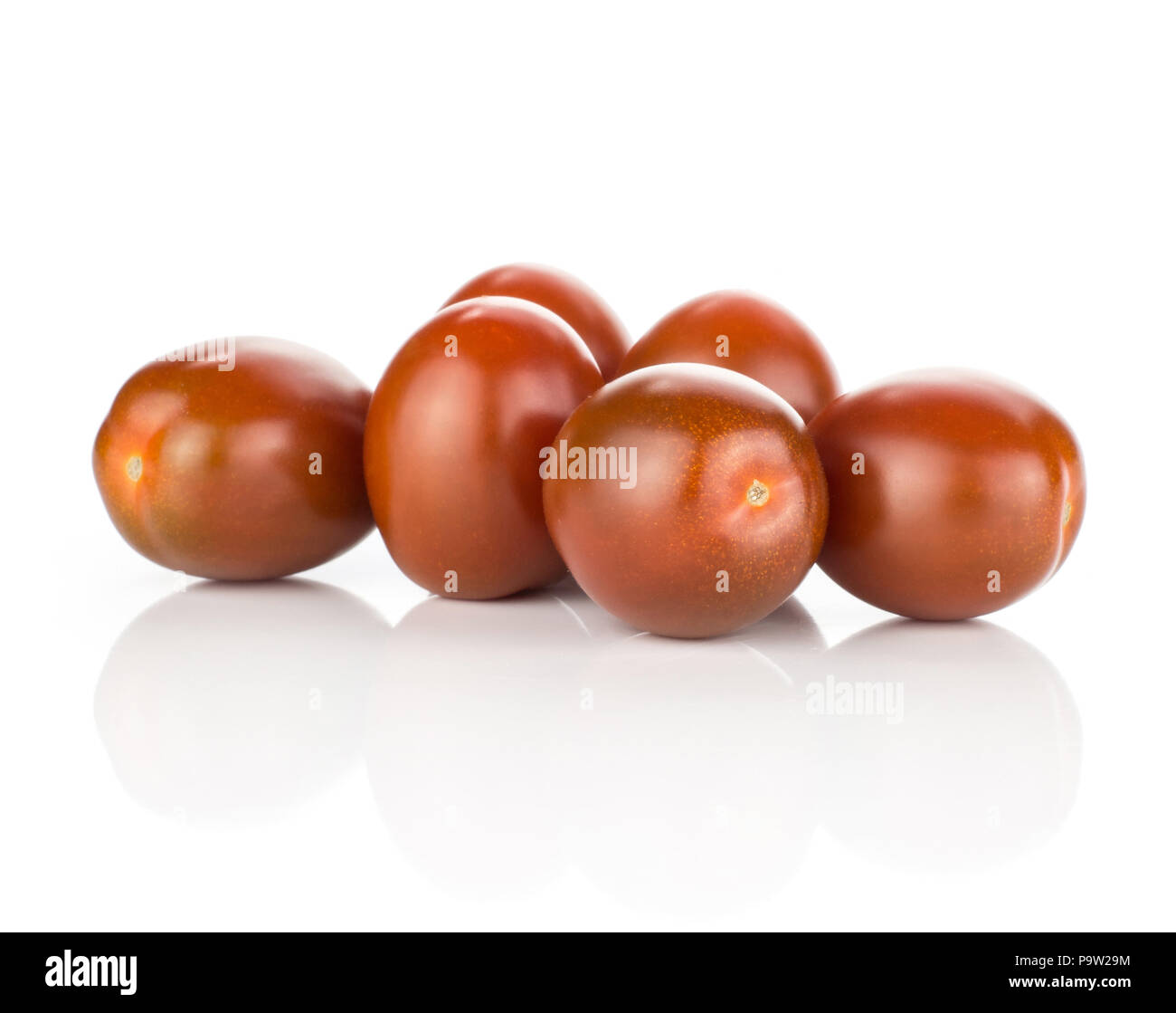 Six black red grape cherry tomatoes isolated on white background Stock ...