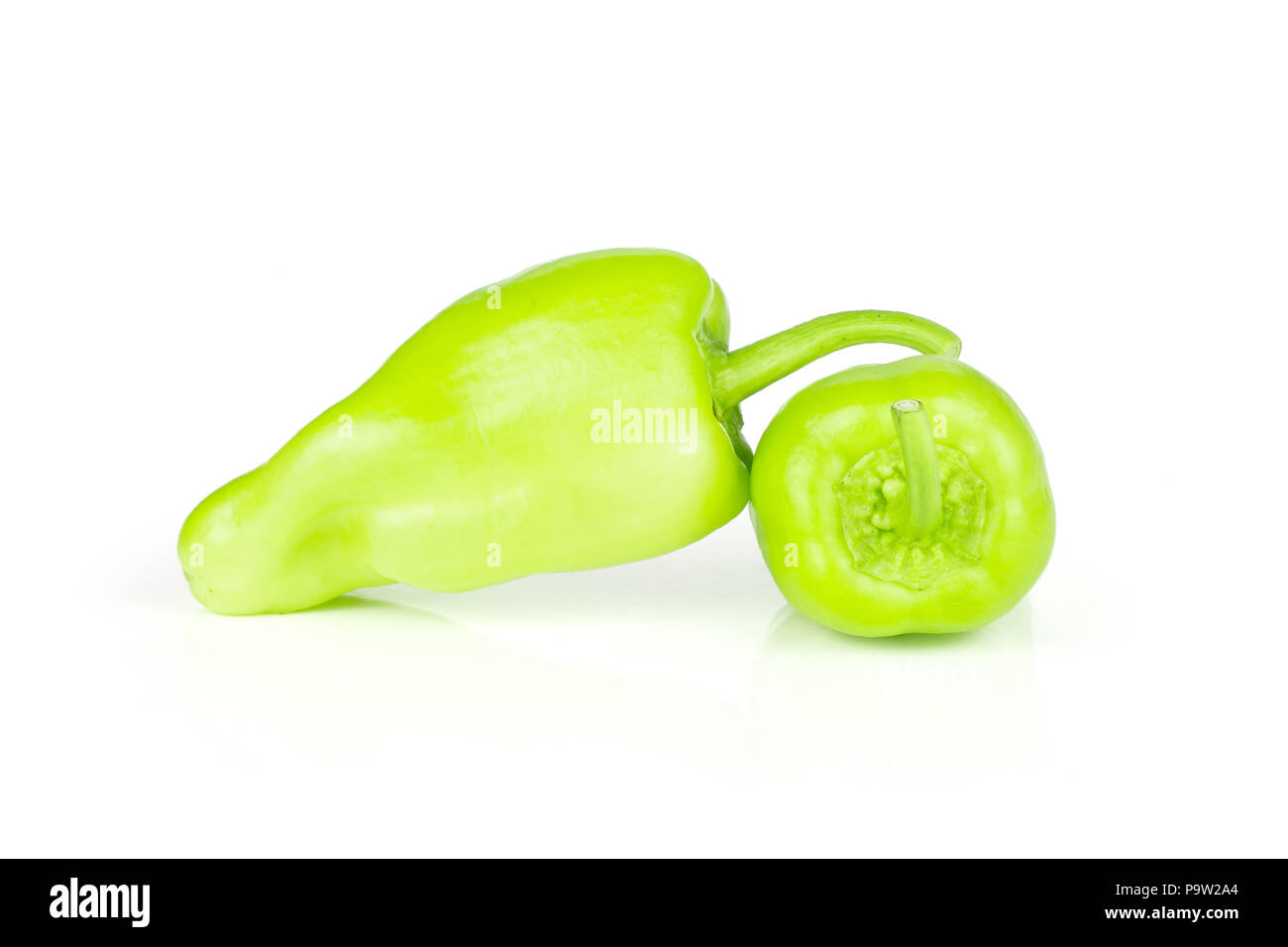 Group of two whole light green bell pepper isolated on white Stock ...