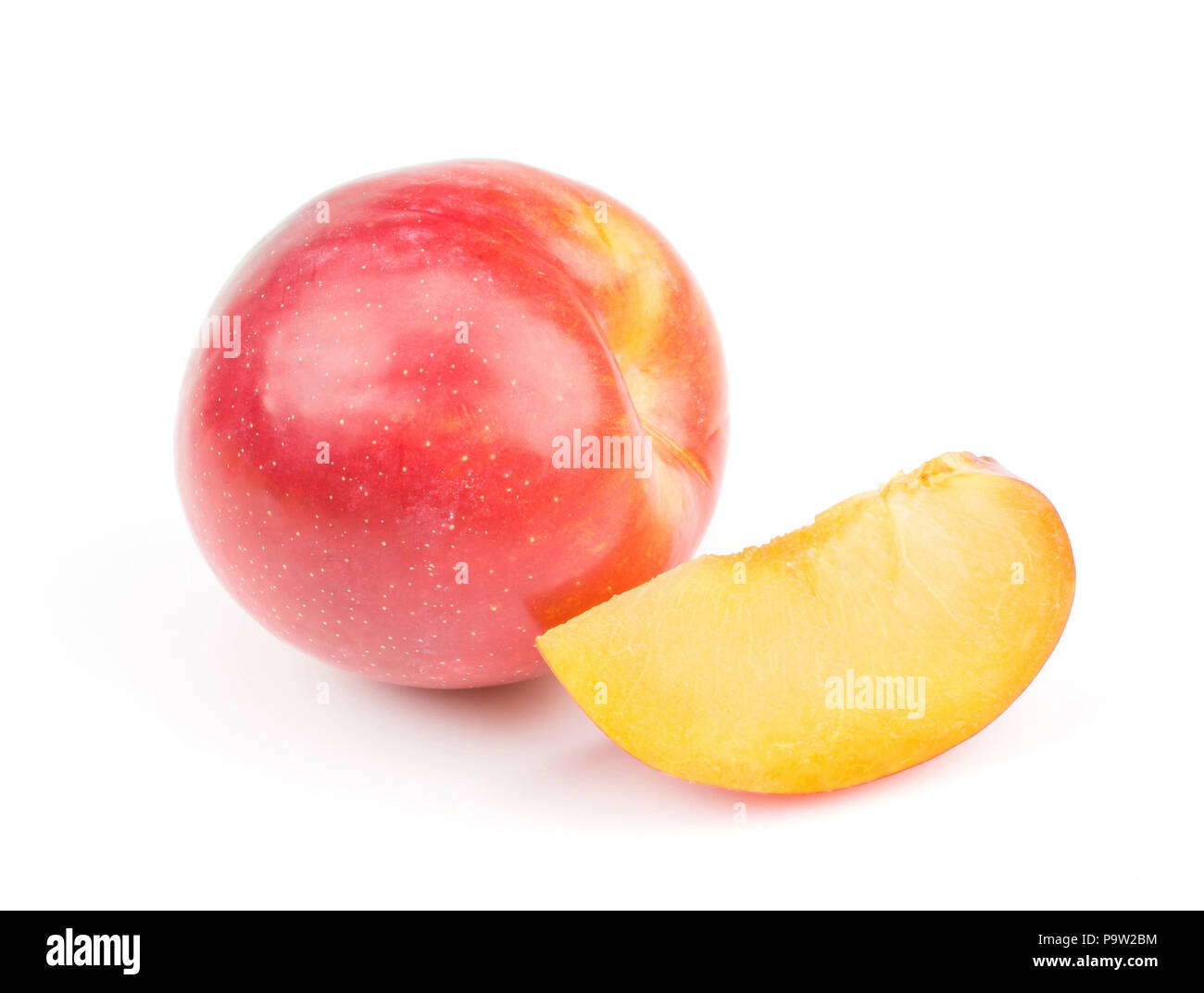 One plum red orange and a slice isolated on white background Stock ...