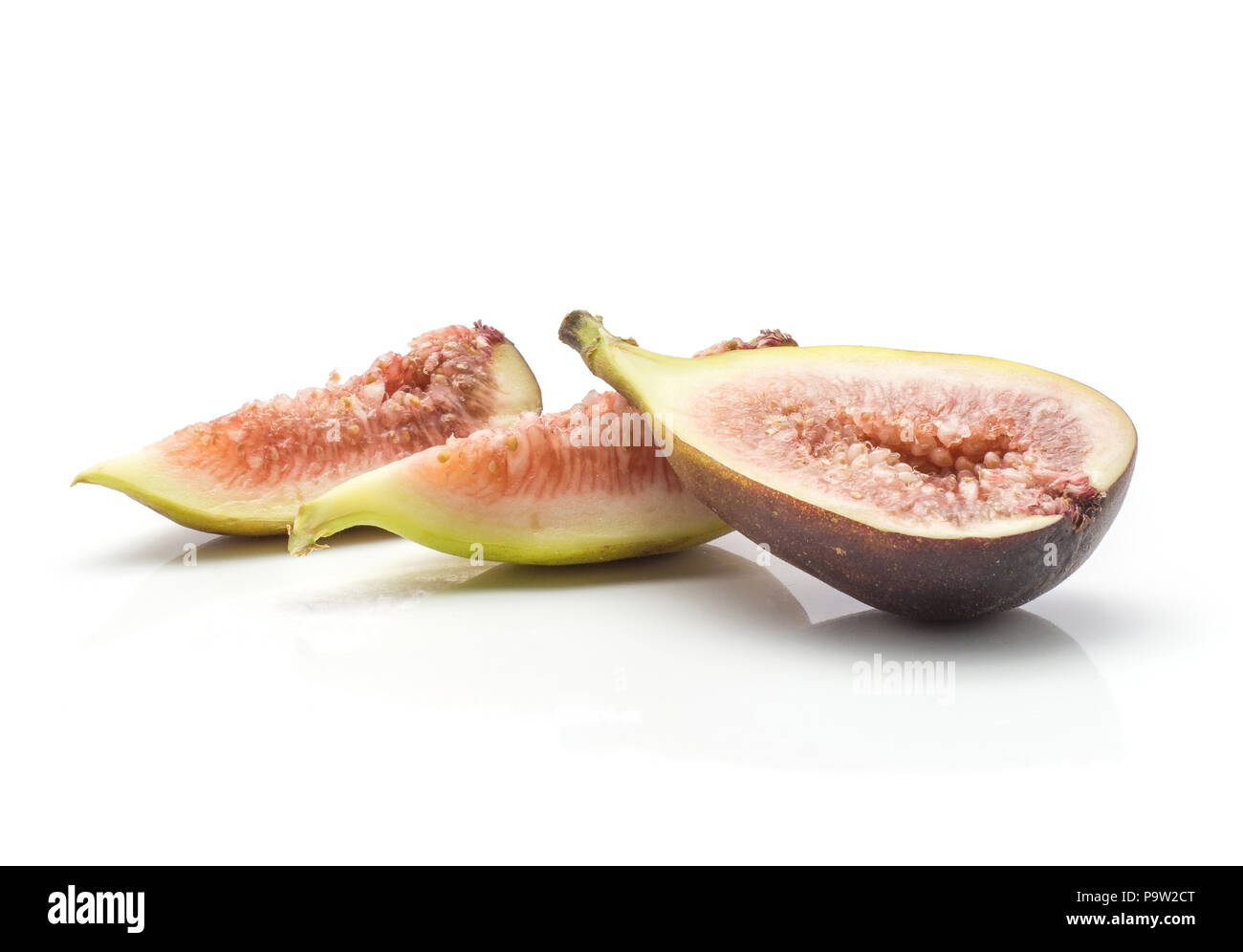 Sliced figs two slices one section half isolated on white background ...