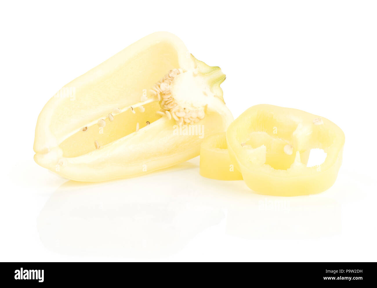 Two white paprika slices (Hungarian sweet pepper) and one section half ...