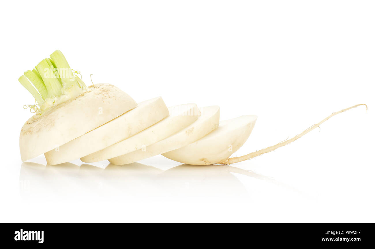 One white radish bulb sliced in round pieces isolated on white ...