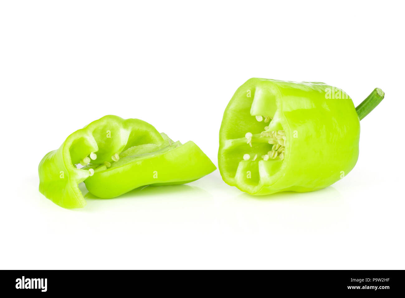 Group of one half two slices of light green bell pepper isolated on ...