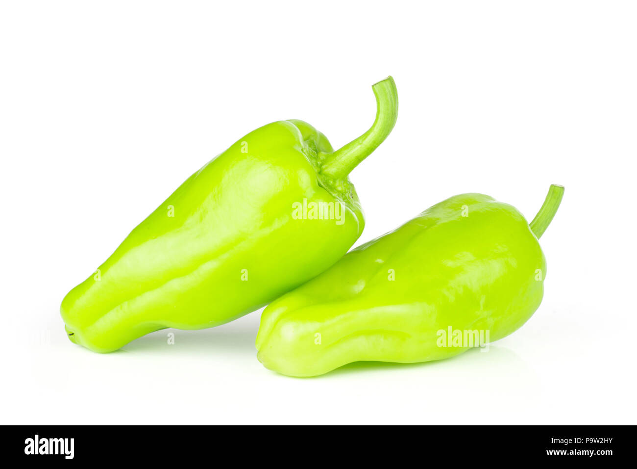 Group of two whole light green bell pepper isolated on white Stock ...