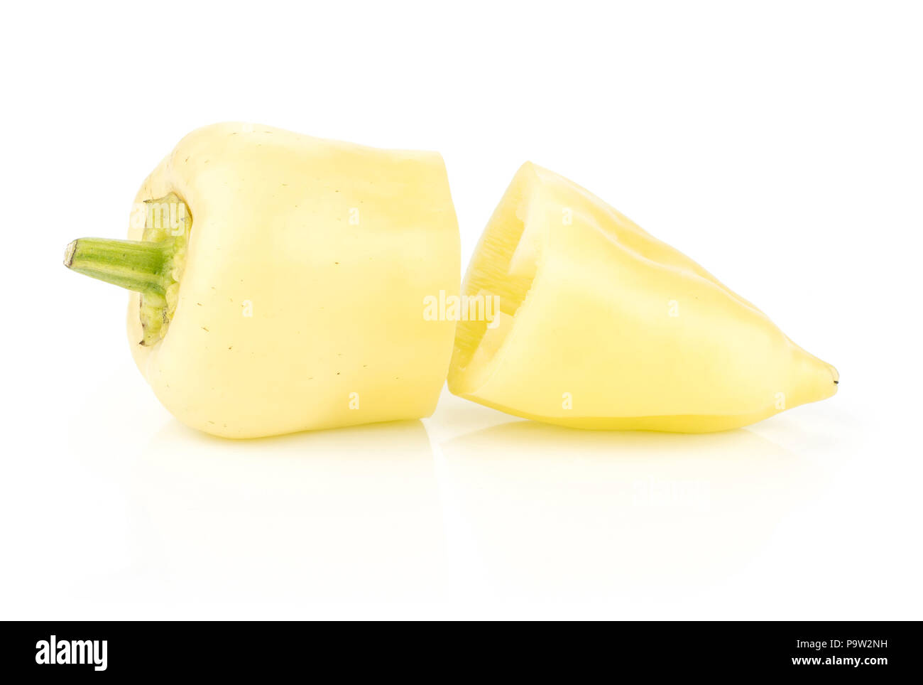 Halved white paprika (Hungarian sweet pepper) isolated on white ...