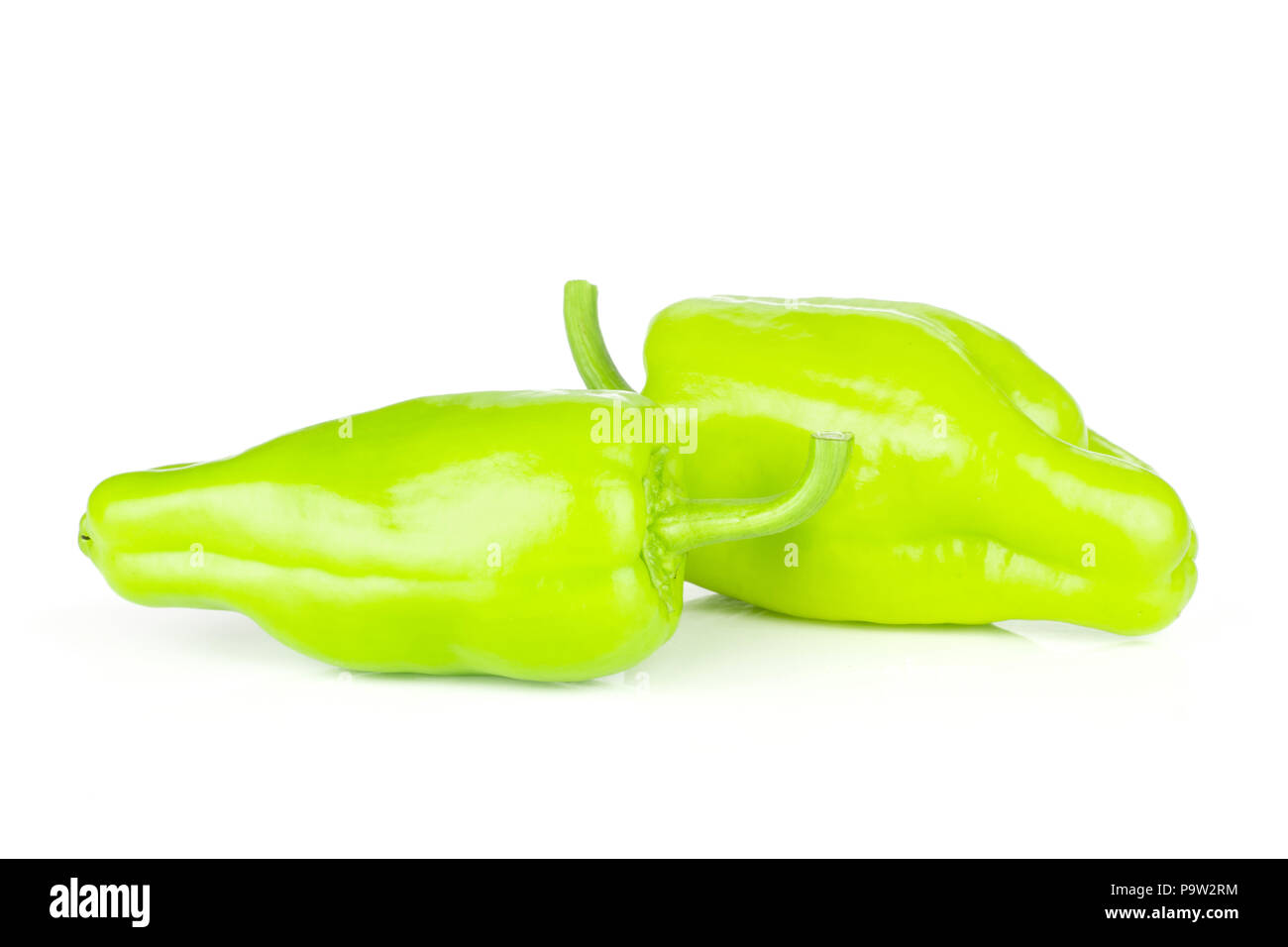 Group of two whole light green bell pepper isolated on white Stock ...