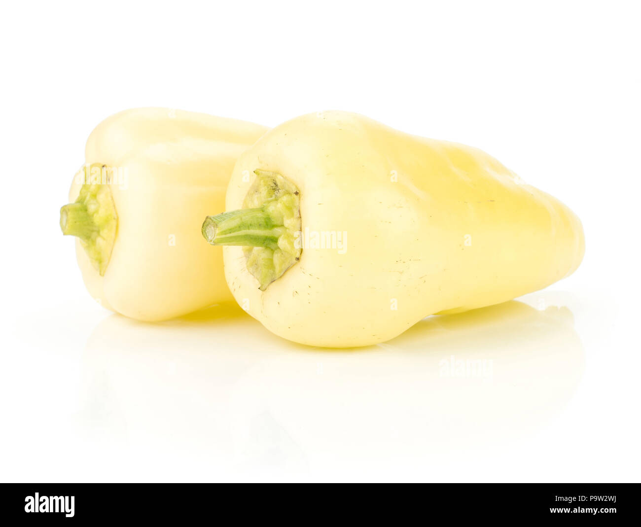 Two white paprika (Hungarian sweet peppers) isolated on white ...