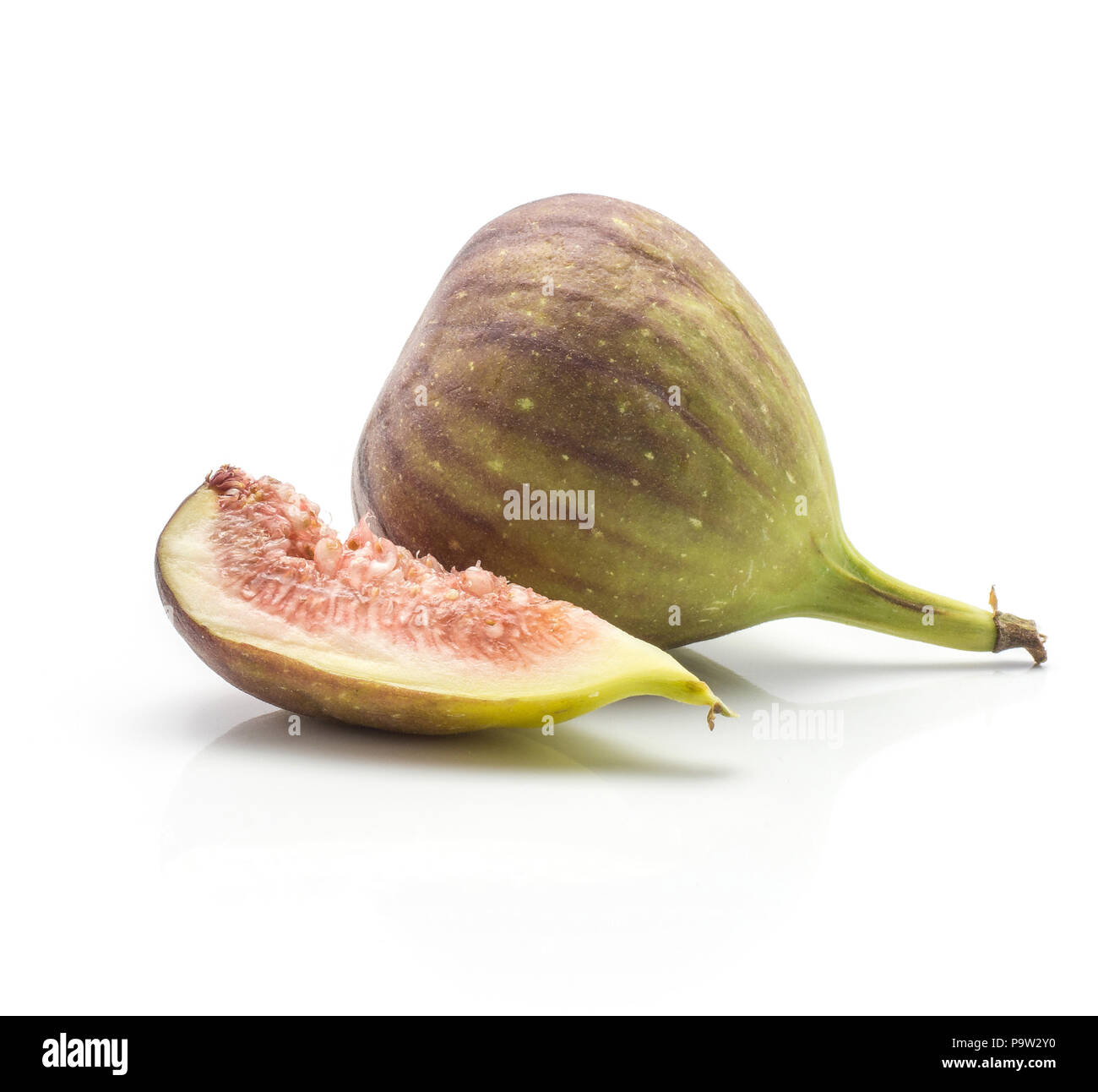 One fig one slice isolated on white background ripe fresh purple green ...