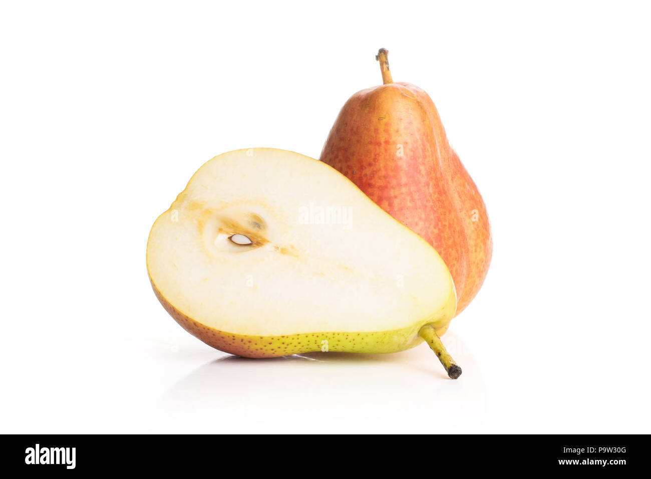 Group of one whole one half of fresh red pear forelle variety isolated ...