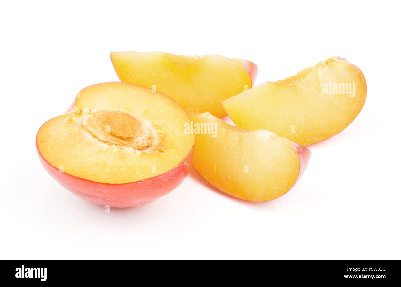 Sliced plum red orange isolated on white background one section half ...