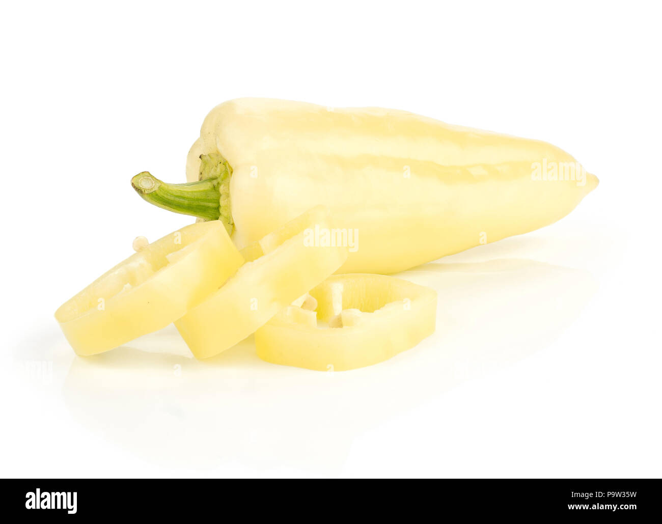 One white paprika (Hungarian sweet pepper) and three slices isolated on ...