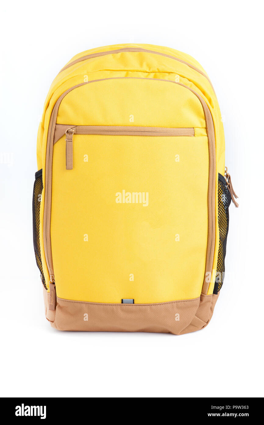 A yellow backpack isolated on white background Stock Photo - Alamy