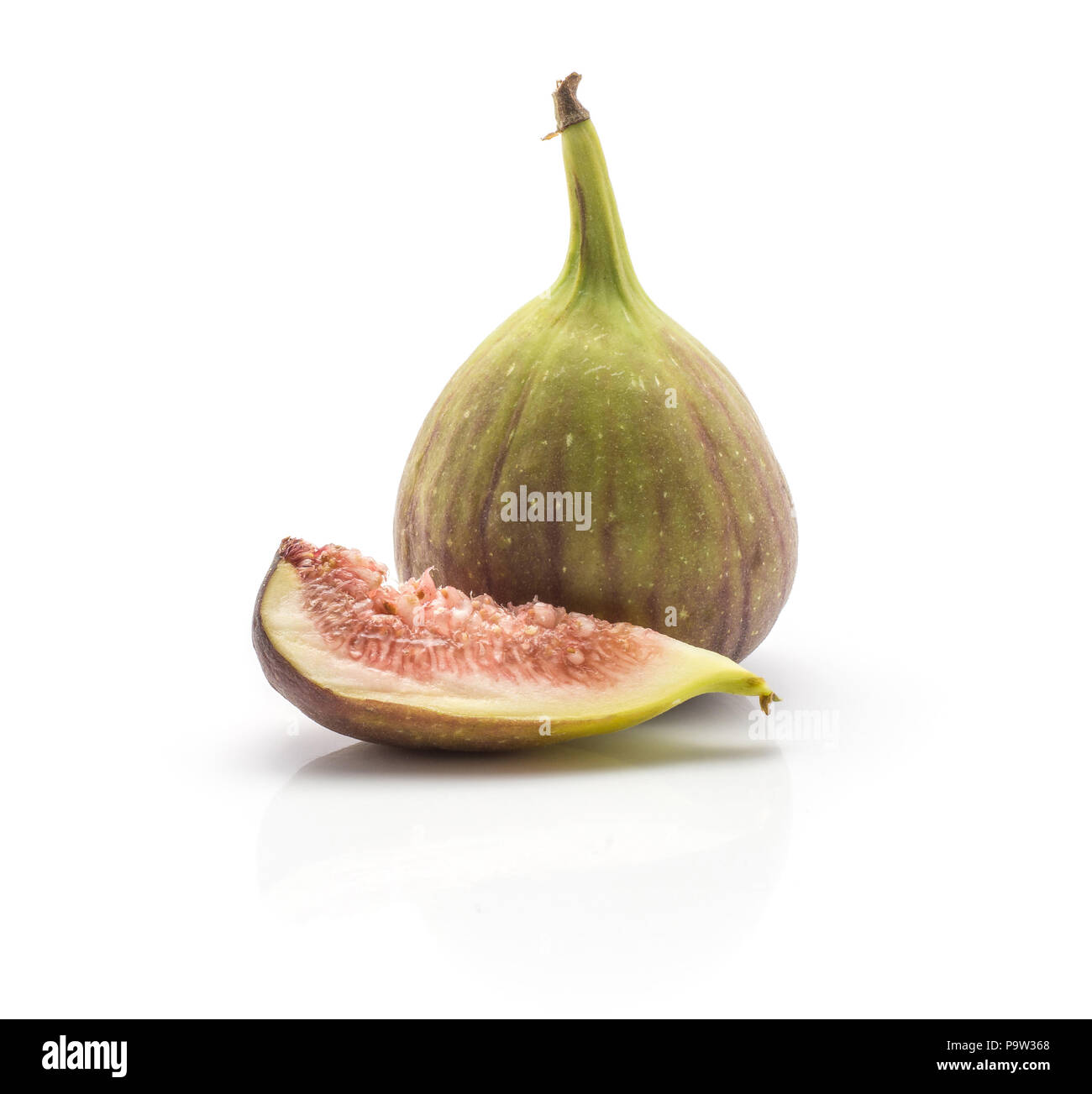 One fig and one slice isolated on white background ripe fresh purple ...