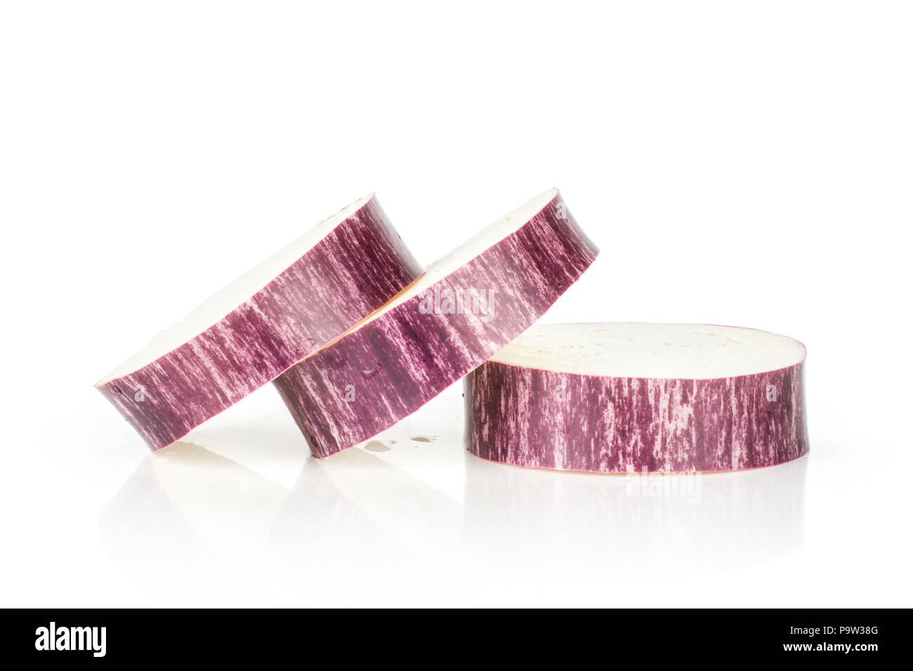 Striped purple eggplant slices three rings isolated on white background ...