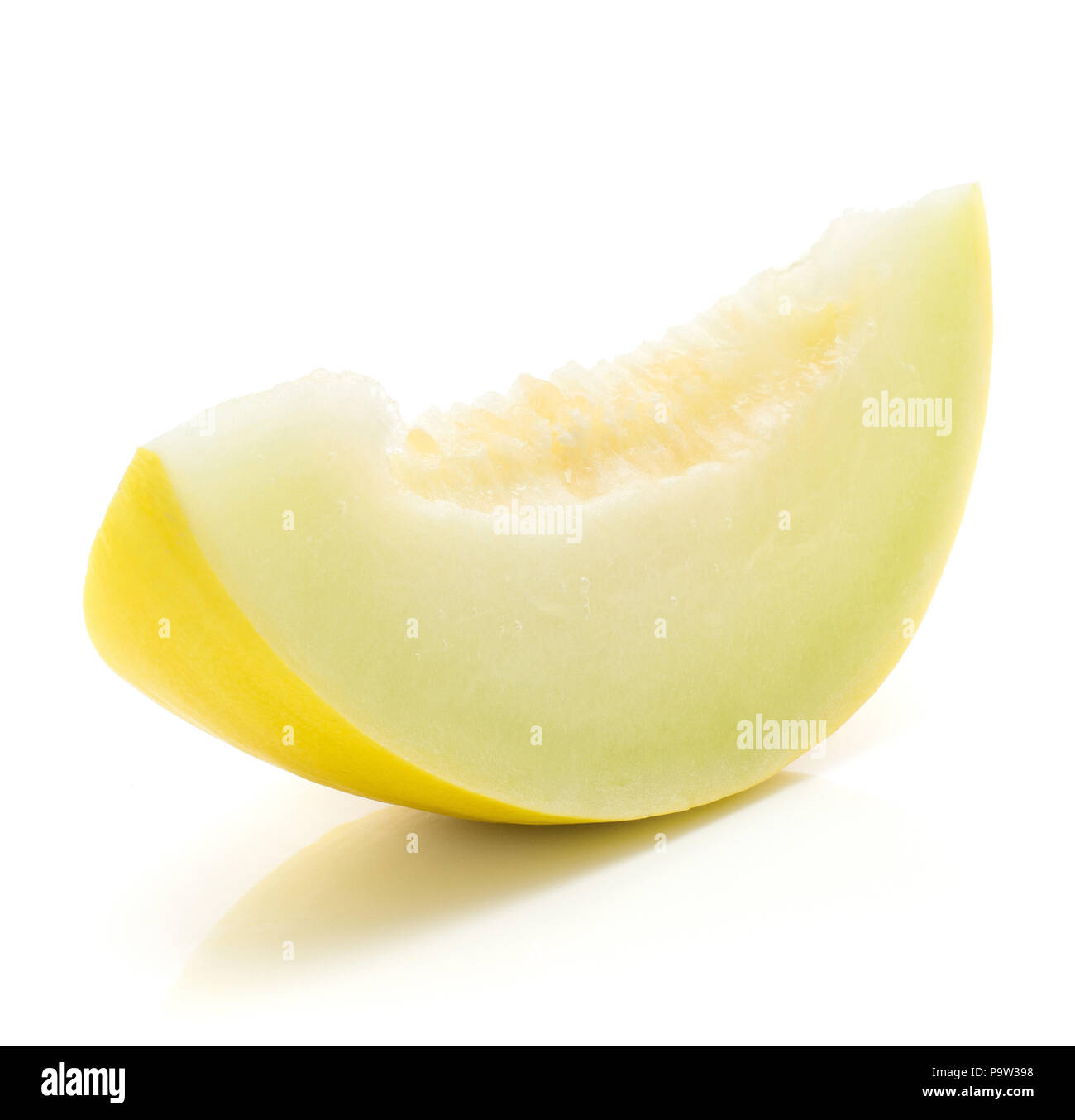 One yellow honeydew melon slice isolated on white background without ...