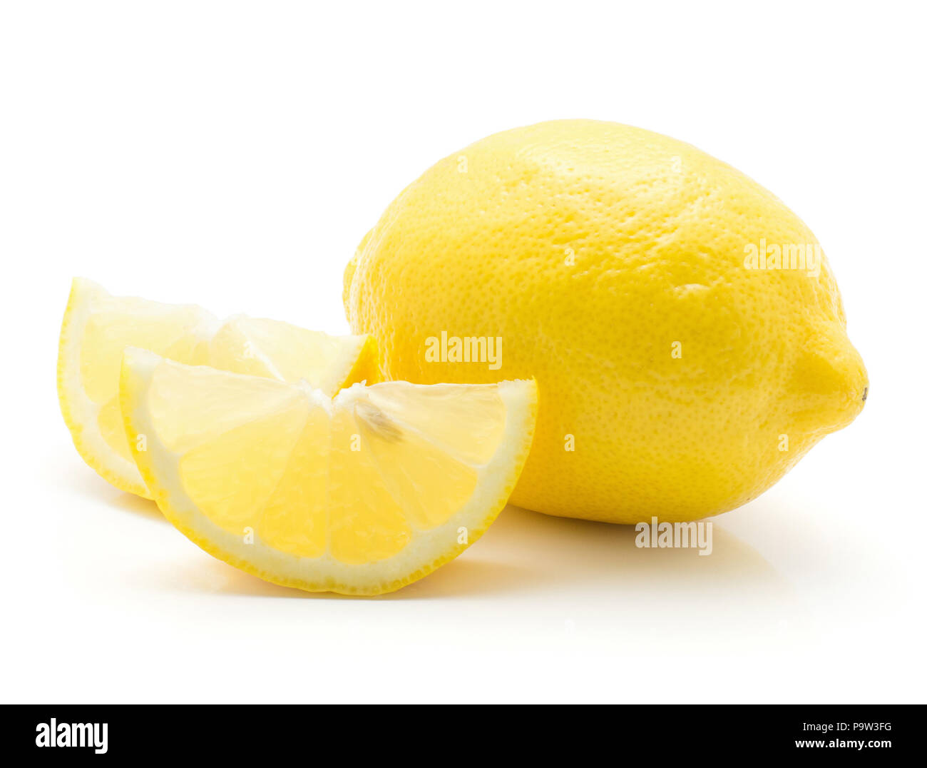 One yellow lemon and two slices with a seed isolated on white ...
