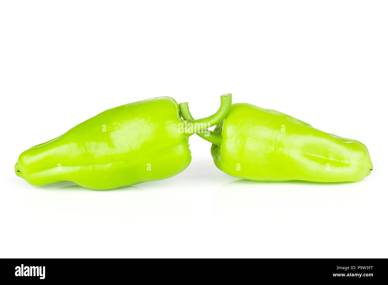 Group of two whole light green bell pepper isolated on white Stock ...