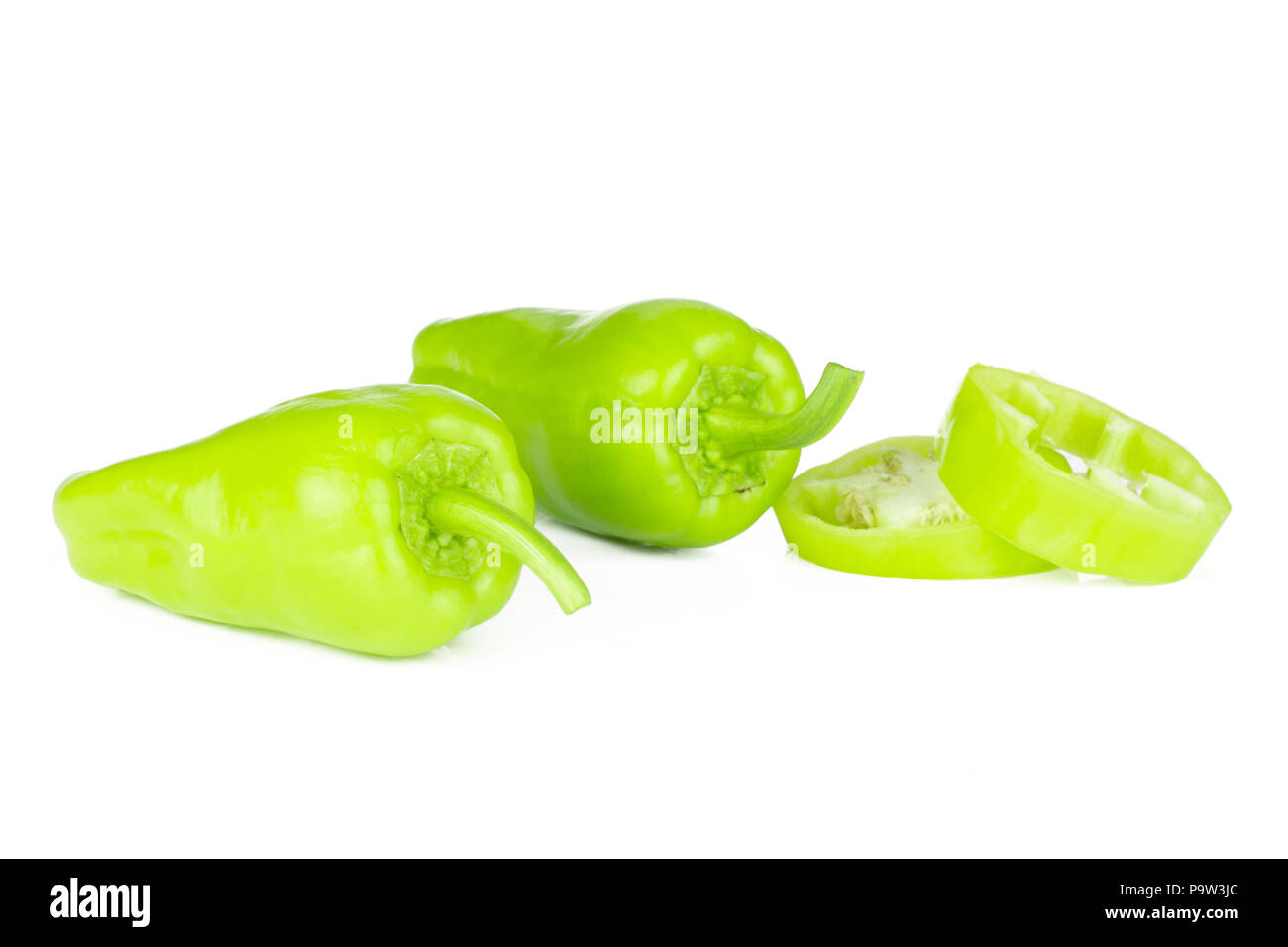 Group of two whole two slices of light green bell pepper isolated on ...