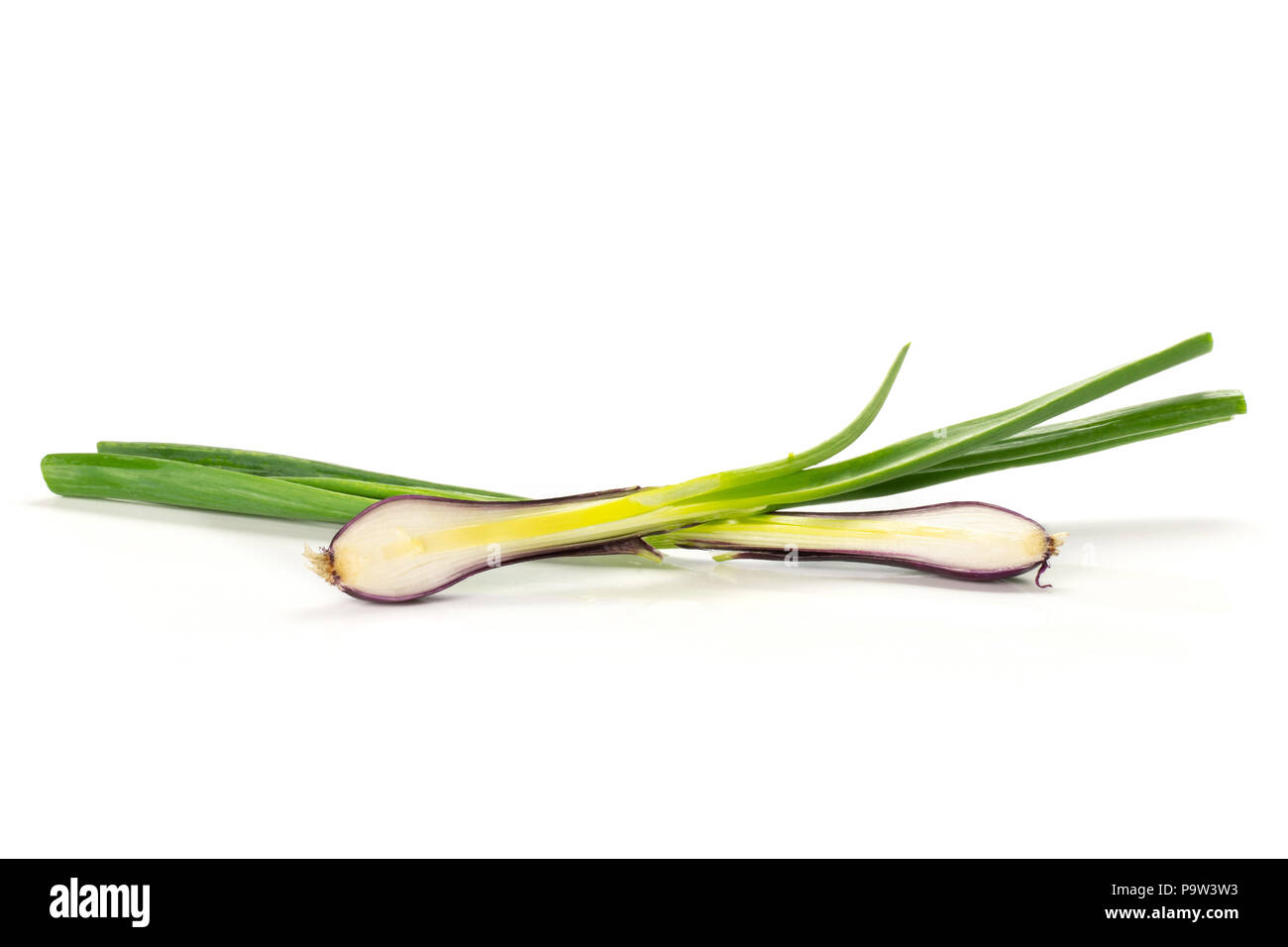 Group of two halves of fresh green spring onion red scallion variety ...