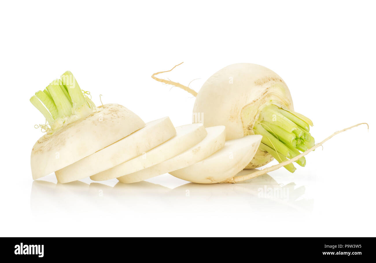 Two white radish bulbs and one sliced in round pieces isolated on white ...