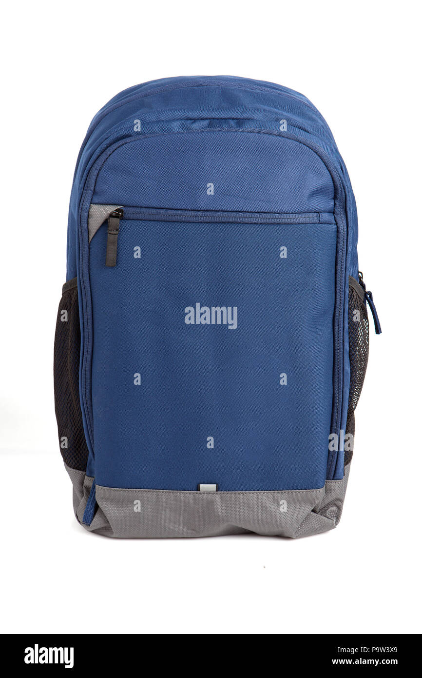 A blue backpack isolated on white background Stock Photo - Alamy