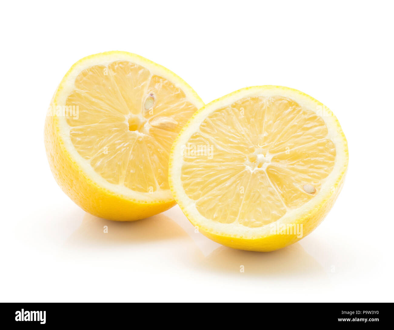 Two lemon halves isolated on white background one yellow lemon cut in ...