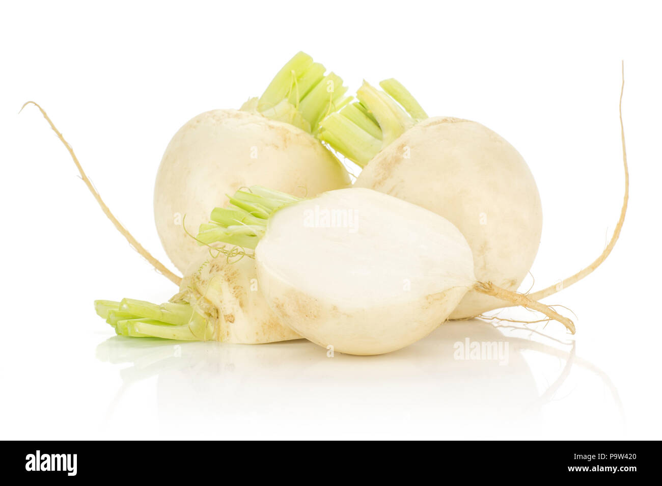 White radish set two bulbs and one half isolated on white background ...