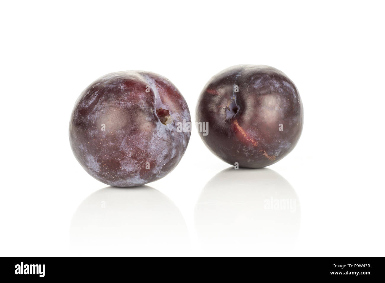 Red plums yellow prunus Cut Out Stock Images & Pictures - Alamy