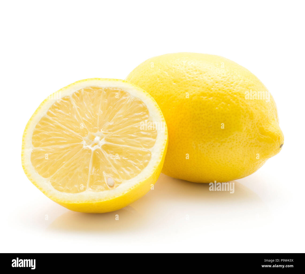 One lemon and section half isolated on white background Stock Photo - Alamy