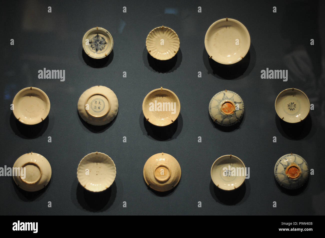 Japanese Plates on display in Japan. These stone made pots are called ...