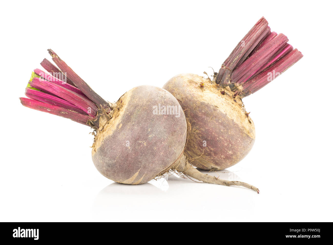Two red beet young bulbs isolated on white background cut tops Stock ...