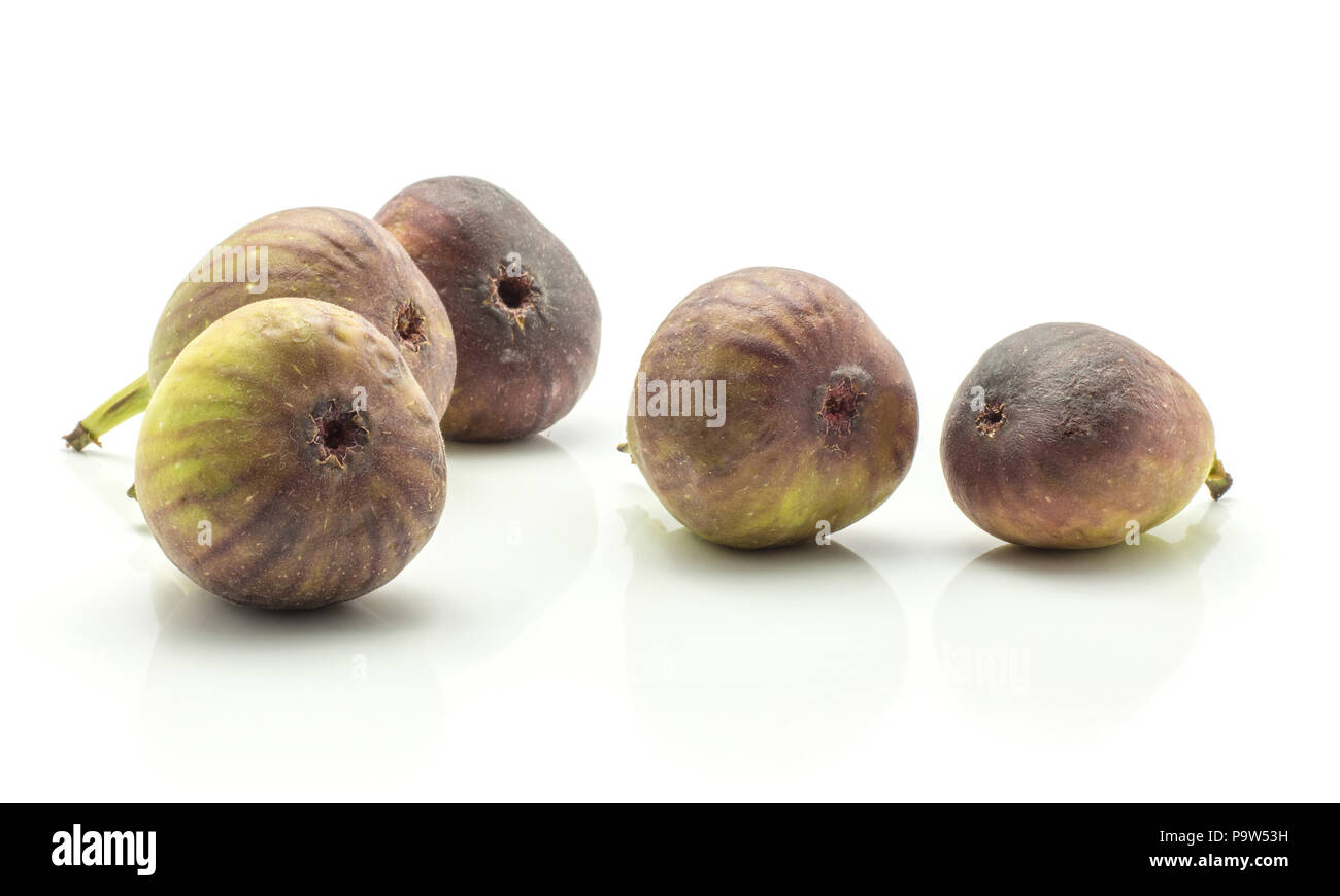 Five figs stack ripe purple green isolated on white background fresh ...