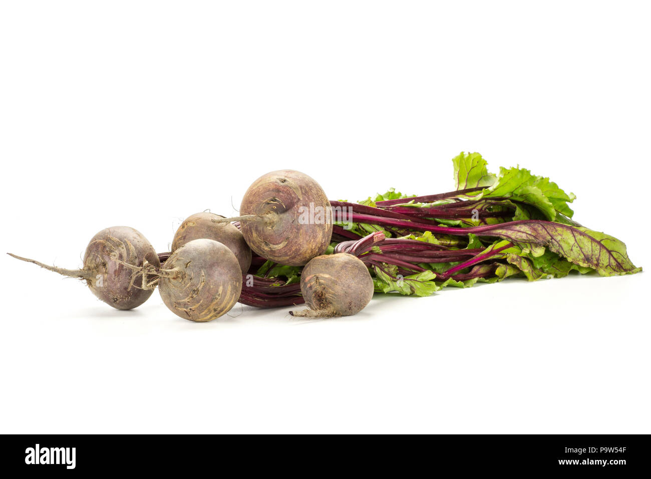 Red beet bundle with greens isolated on white background five bulbs ...