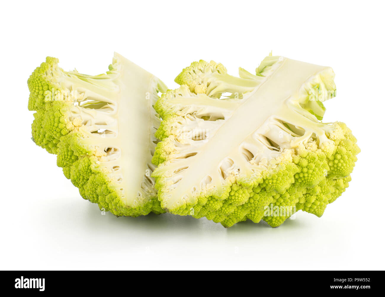Two green Romanesco cauliflower halves isolated on white background ...