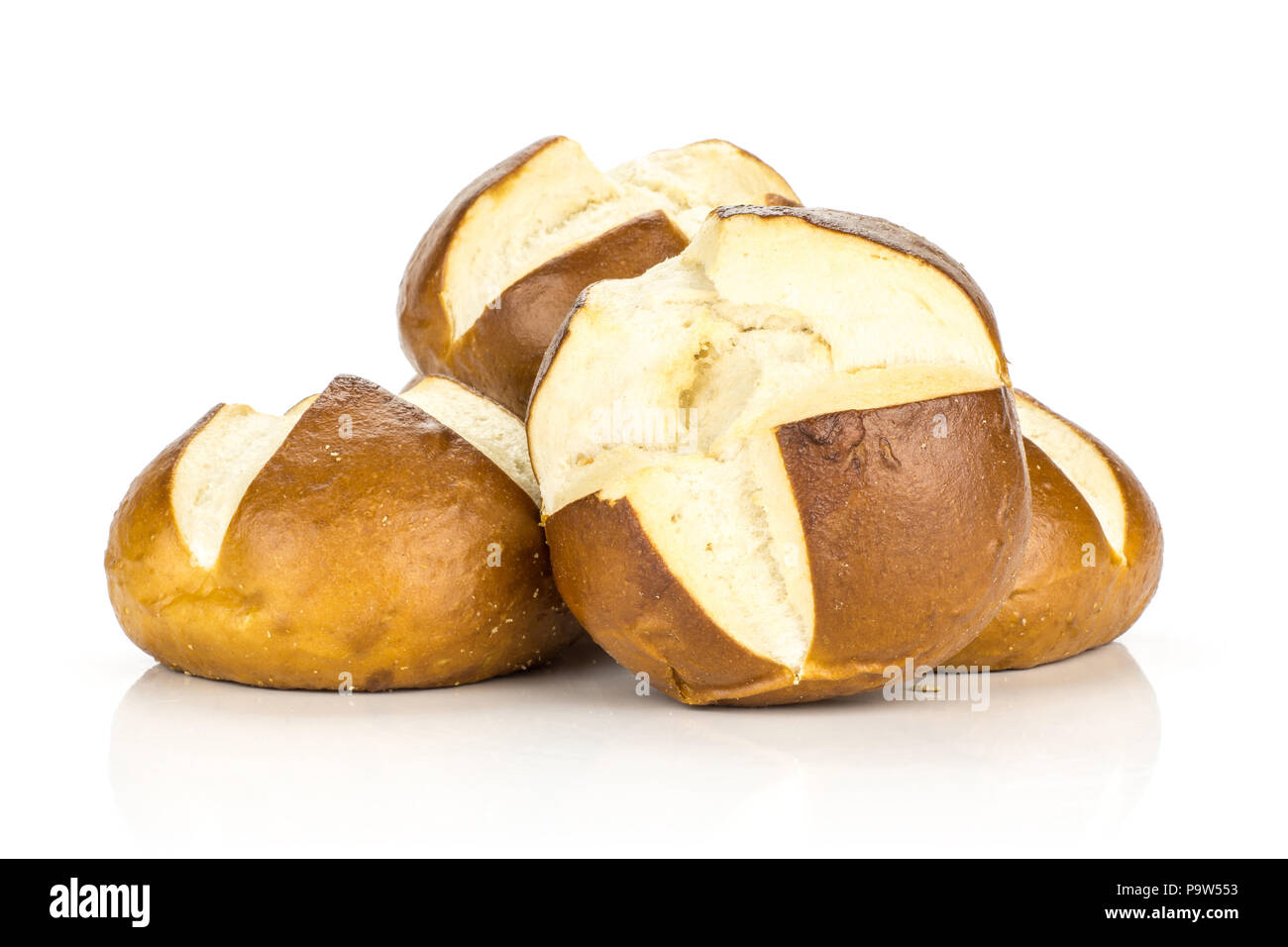 Fresh Bavarian bread buns stack isolated on white background four baked ...