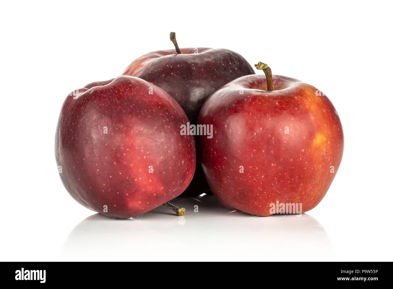 Three red delicious apples isolated on white background deep red Stock ...
