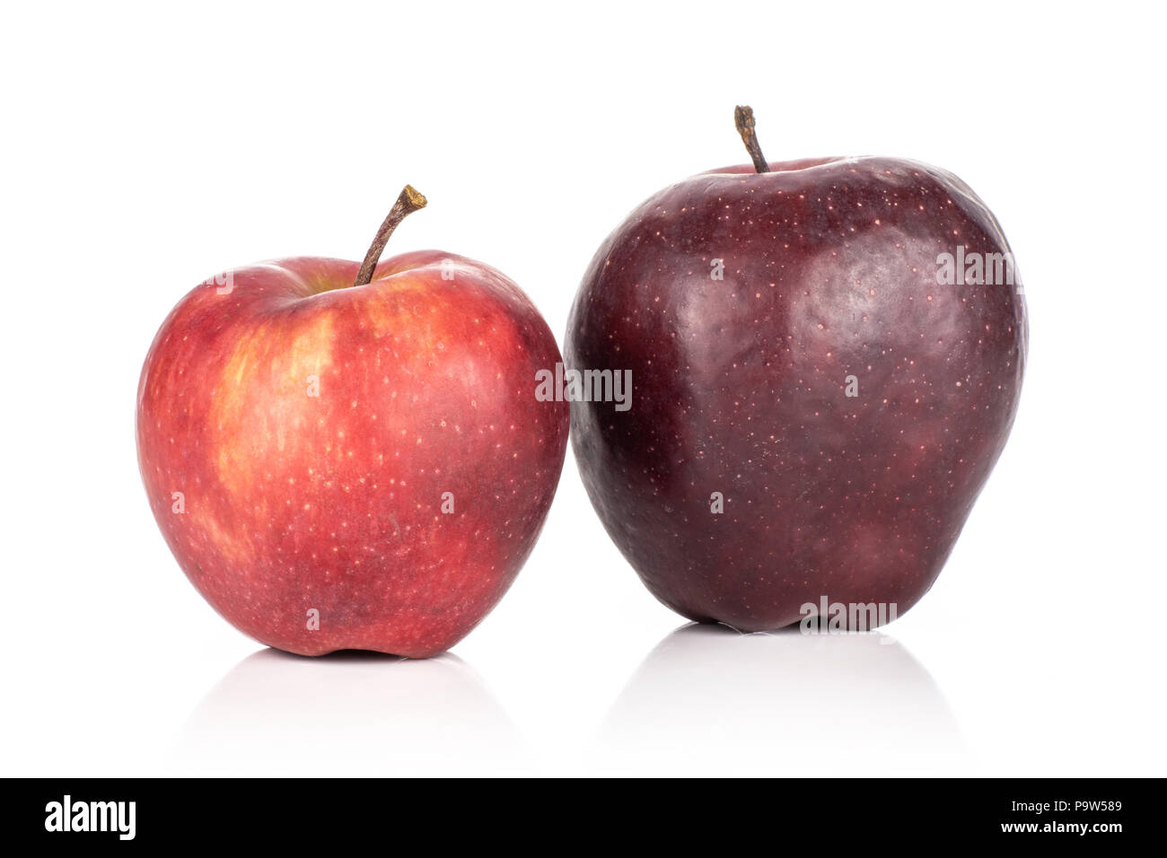 Pair of fresh apples red delicious isolated on white background light ...