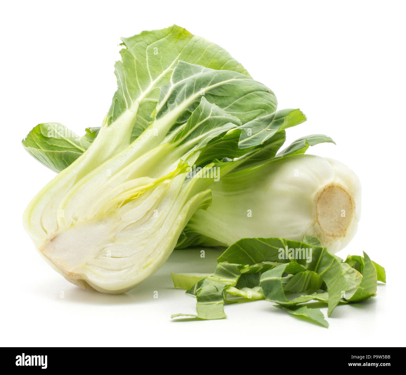 Bok choy (Pak choi) one cabbage with fresh cut half and chopped leaves ...