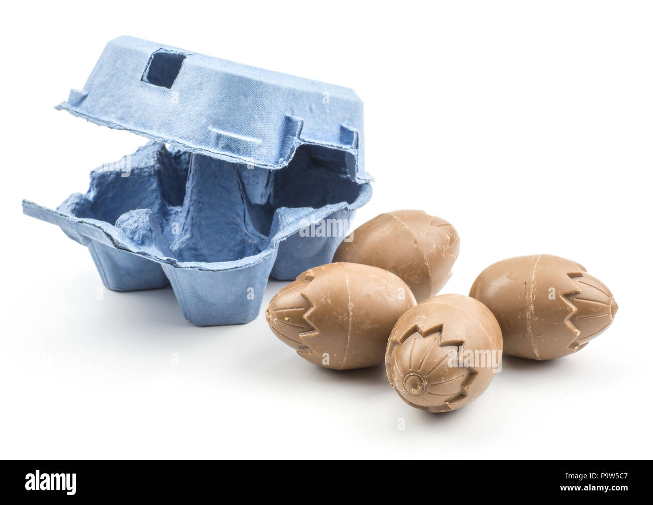Four chocolate eggs with a blue box isolated on white background Stock ...