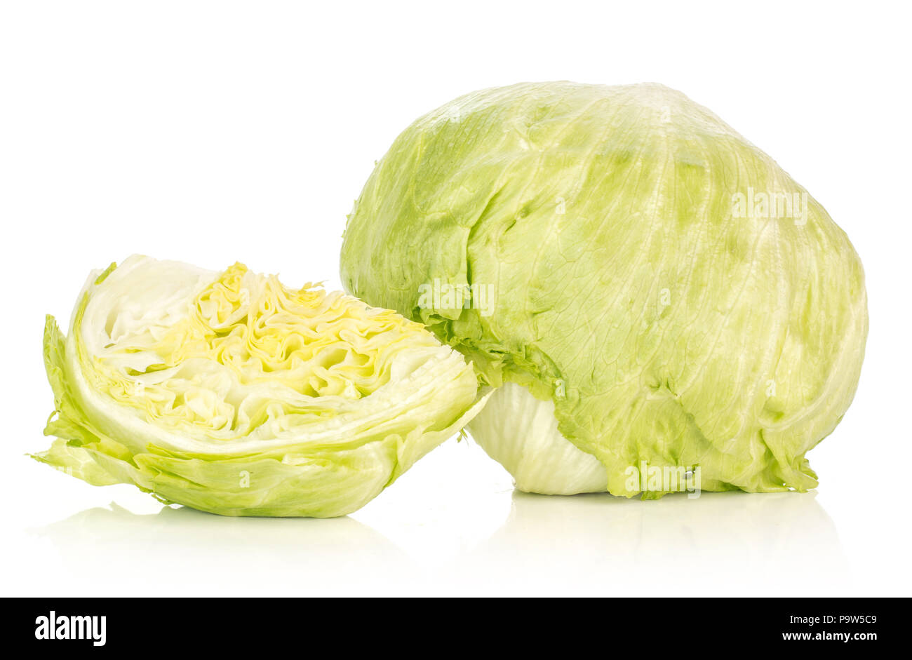 Iceberg lettuce one fresh cabbage head and sliced quarter isolated on ...