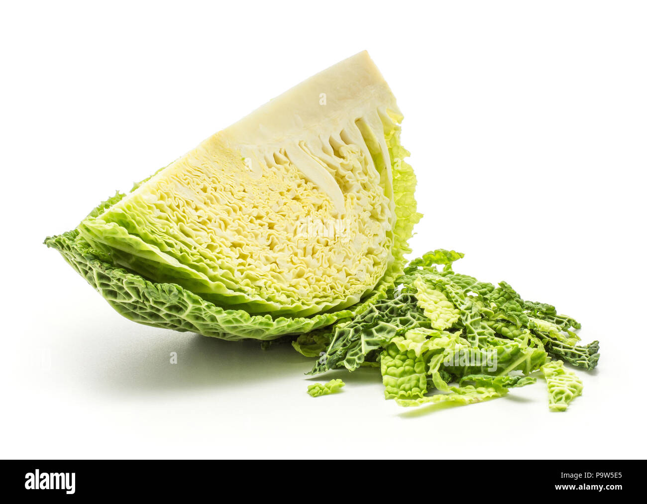One savoy cabbage slice with chopped leaves stack isolated on white ...