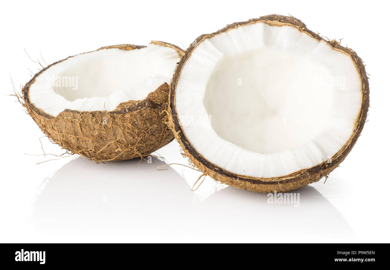 Two coconut section halves isolated on white background one broken in ...