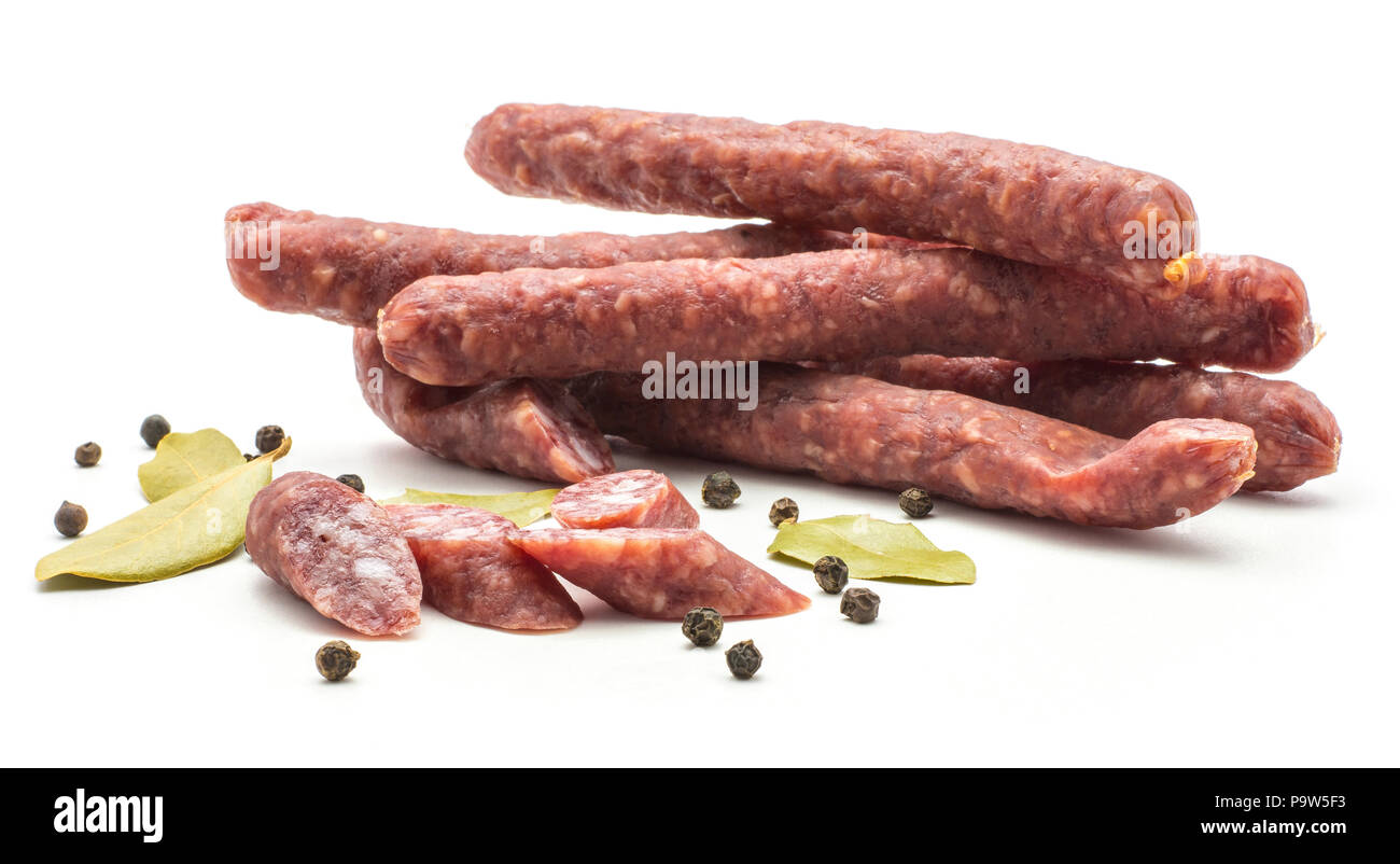 Hungarian dry sausages pepperoni set with black pepper and bay leaves ...