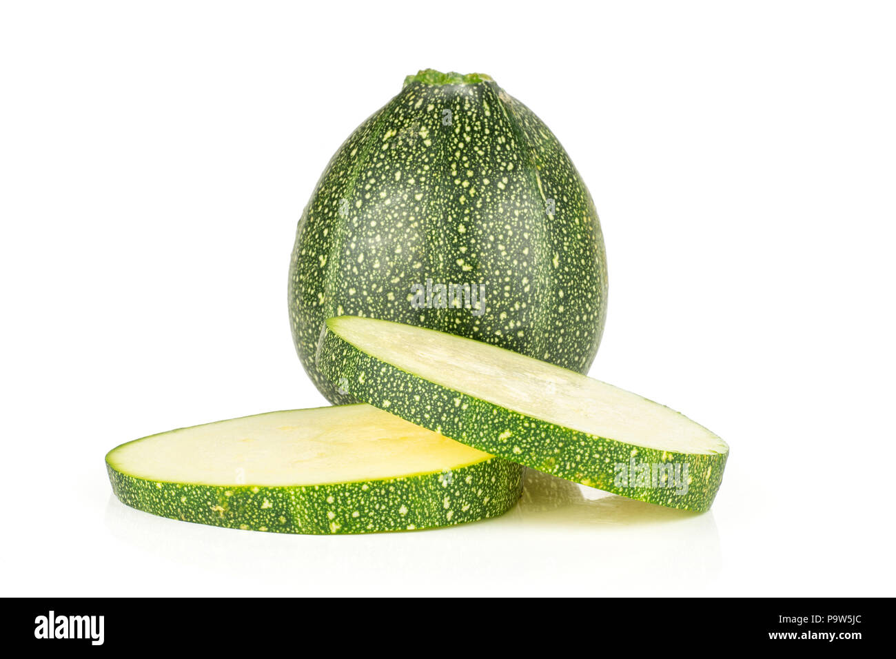 One round zucchini and two slices isolated on white background fresh ...
