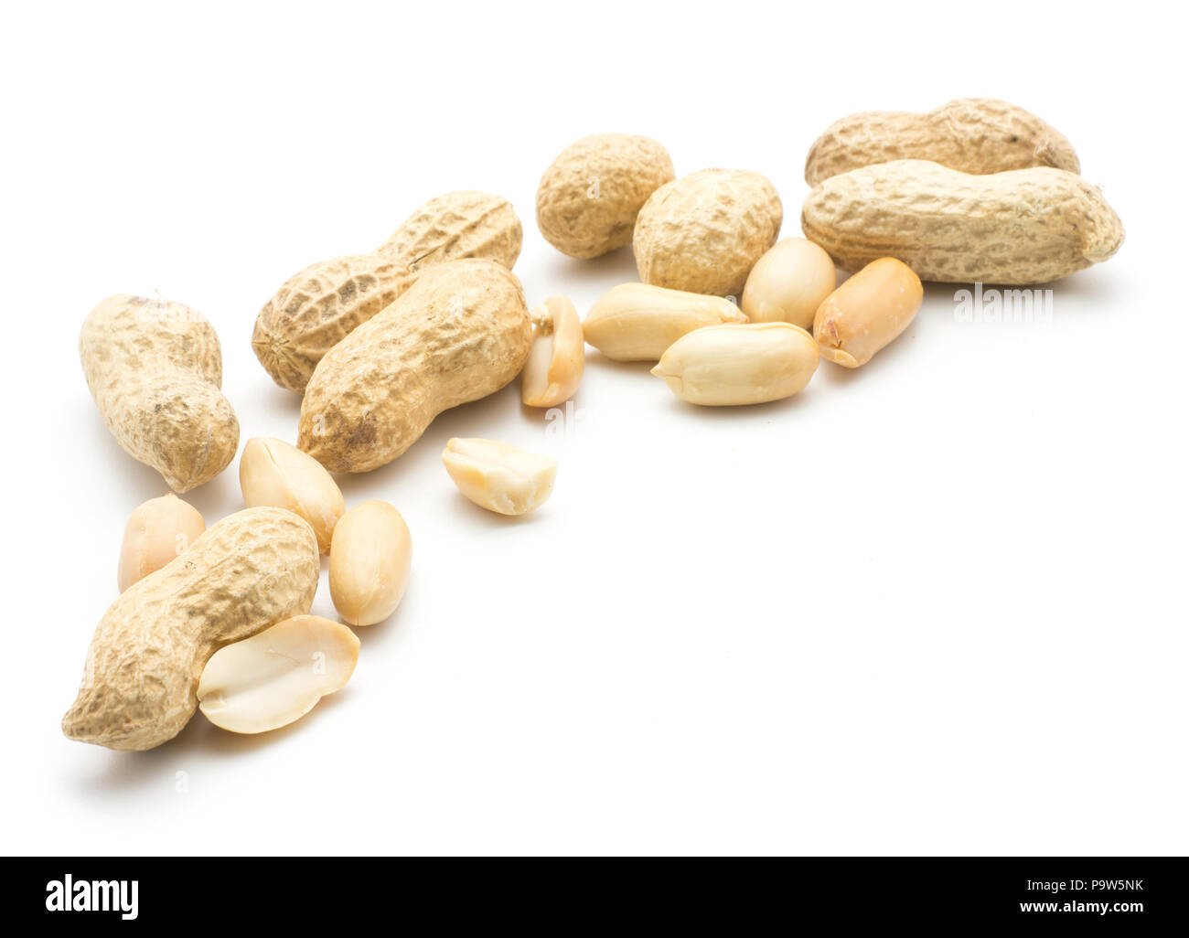 Raw peanuts isolated on white background (unshelled, shelled without ...