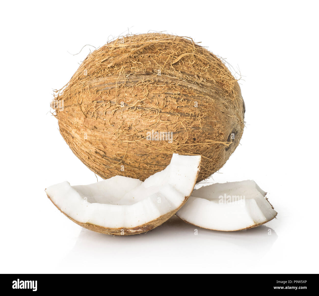 One coconut with two broken pieces isolated on white background brown ...