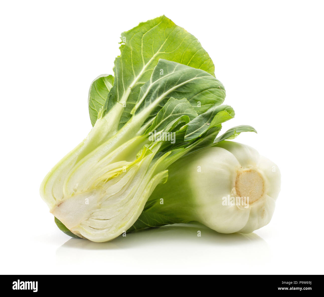 Bok choy (Pak choi) one cabbage and one sliced half isolated on white ...