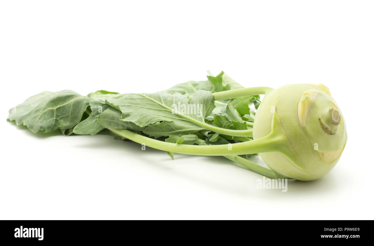 One kohlrabi (German turnip or turnip cabbage) bulb with fresh leaves ...