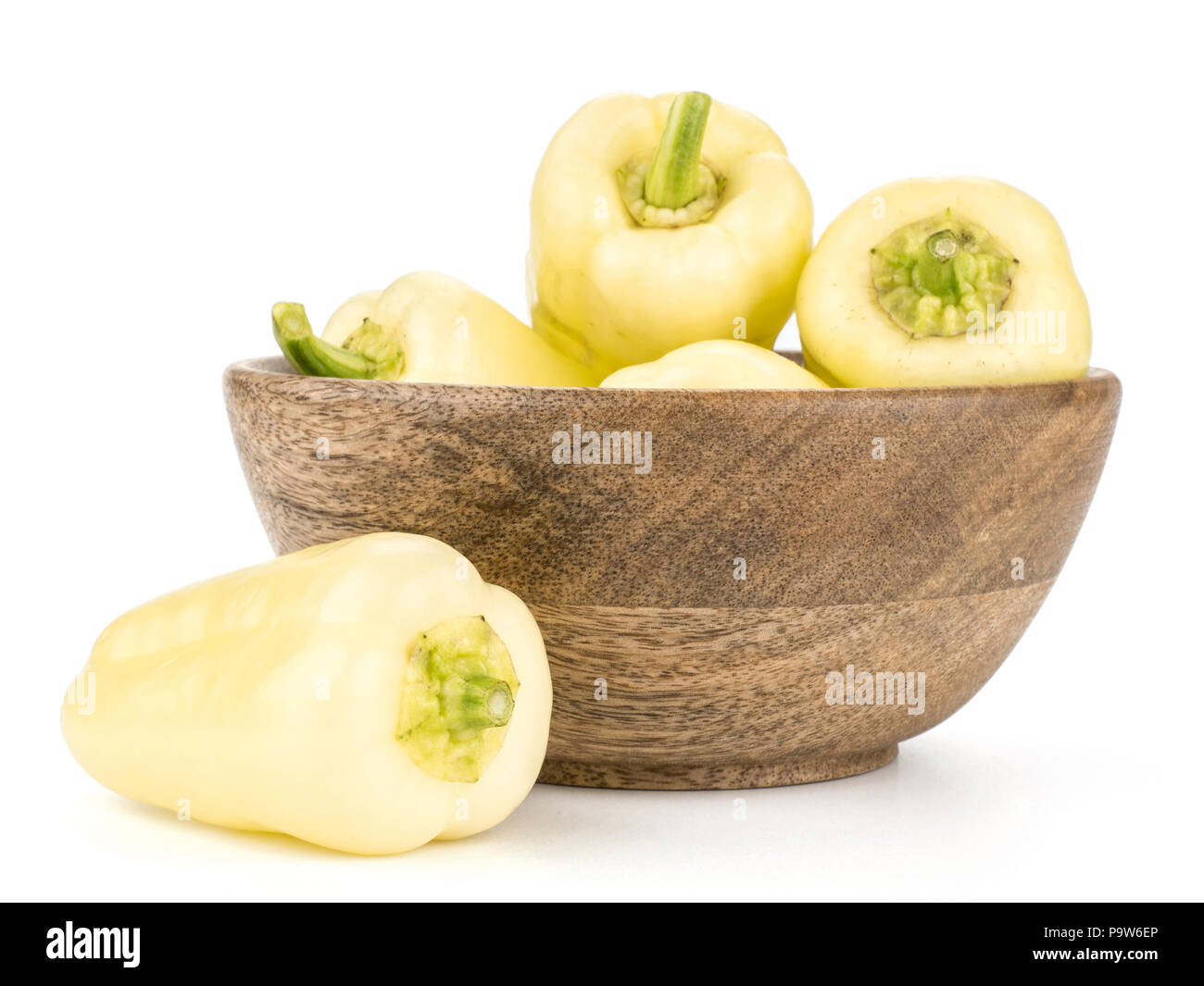 White paprika (Hungarian sweet peppers) in a wooden bowl isolated on ...